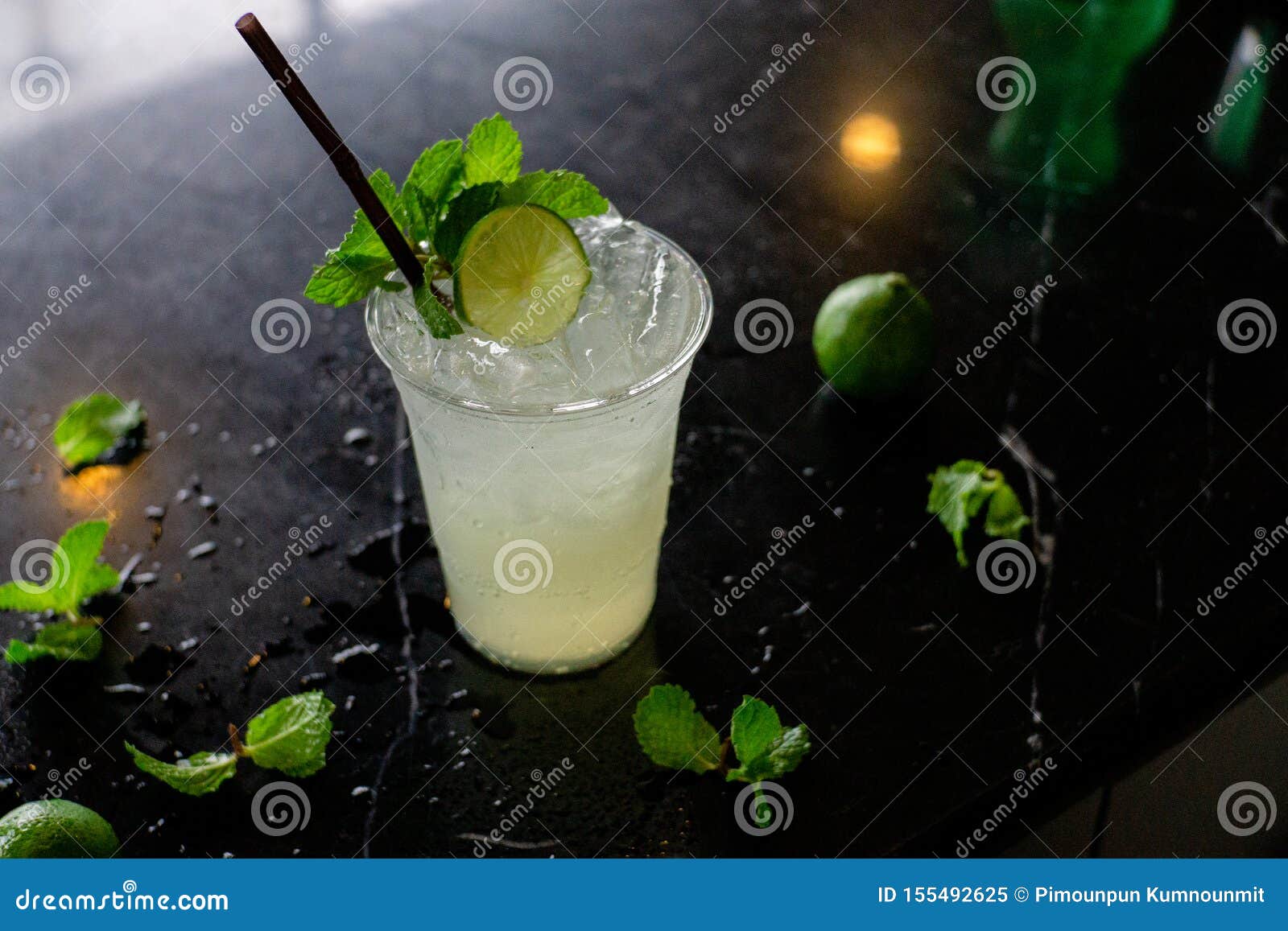Lemon Soda with Ice in Plastic Glass. Stock Image - Image of marbles ...