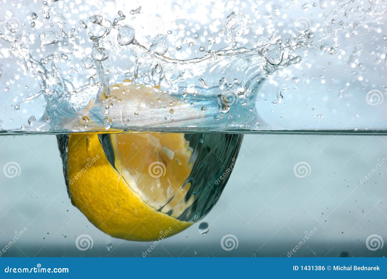Lemon splash into water stock photo. Image of lifestyle - 1431386