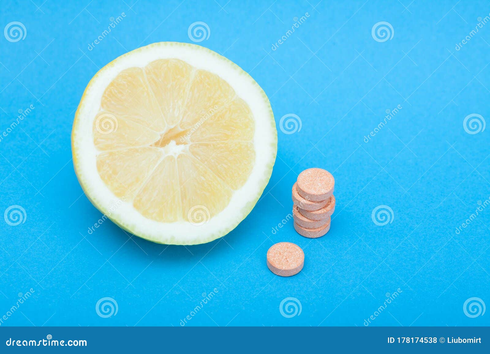 Lemon with Stack of Orange Pills Stock Photo - Image of immunity ...