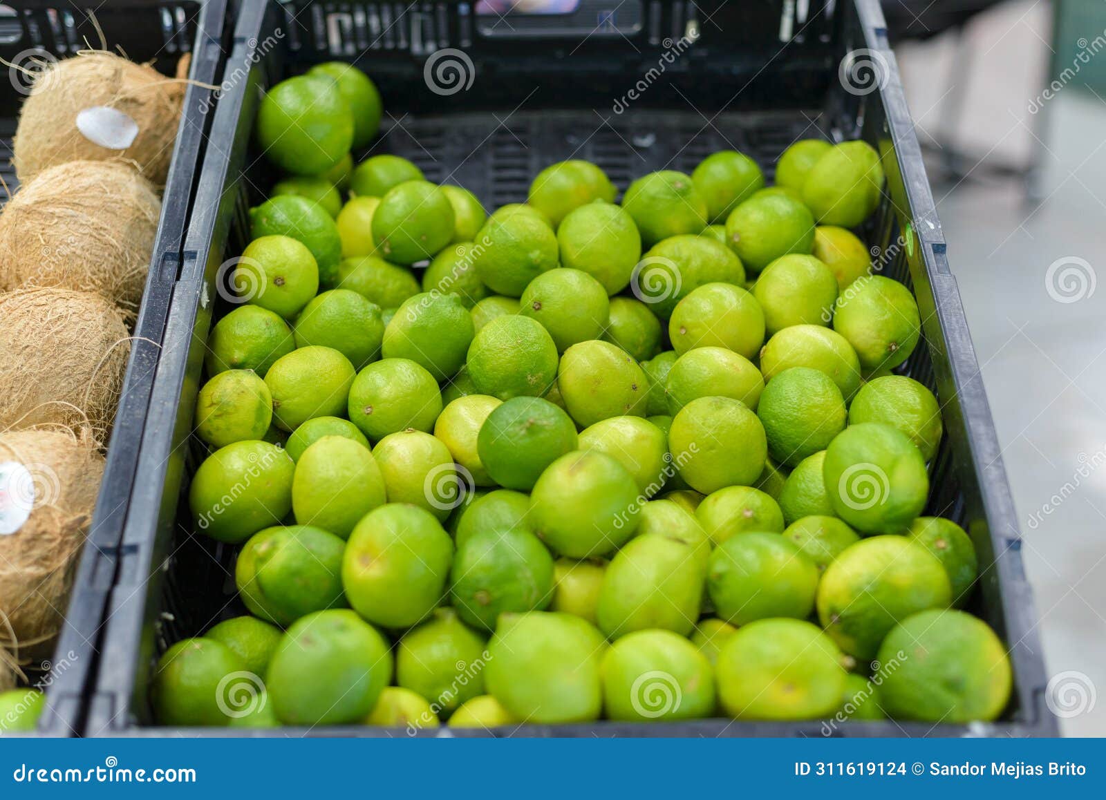Lemon Stand in a Supermarket Stock Photo - Image of marketplace, green ...