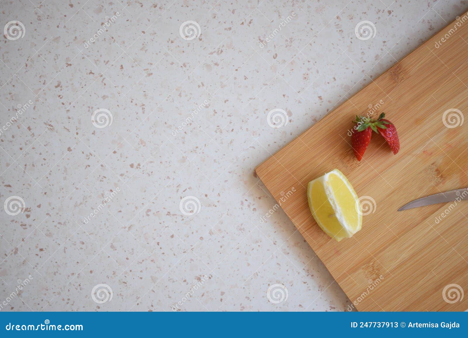 Lemon and Strawberries Cut on the Kitchen Counter Stock Image - Image ...