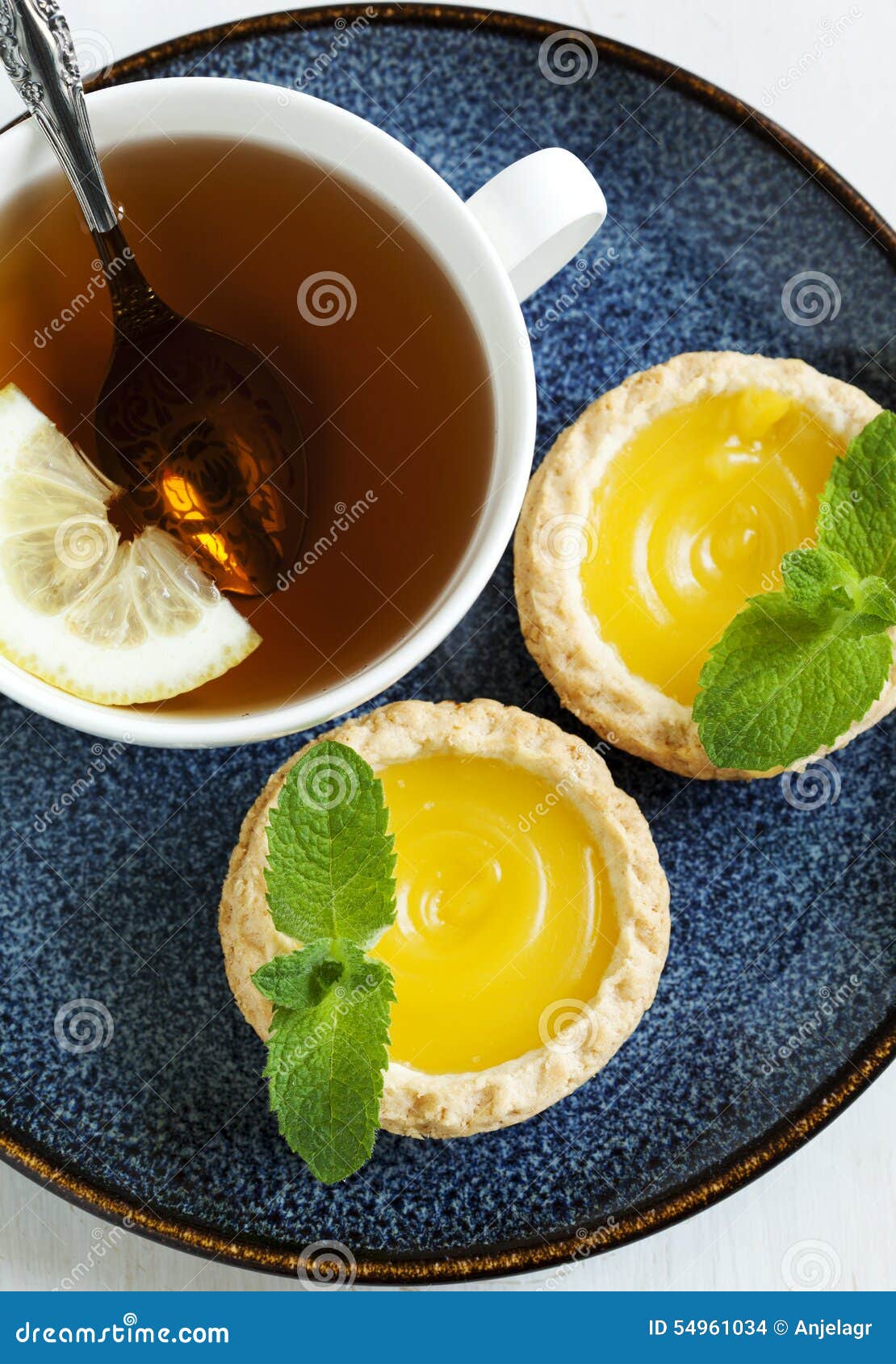 Lemon Tart and cup of tea stock photo. Image of yellow - 54961034