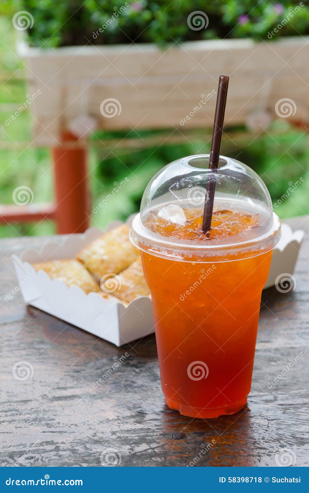Lemon tea in plastic cups stock photo. Image of summer - 58398718