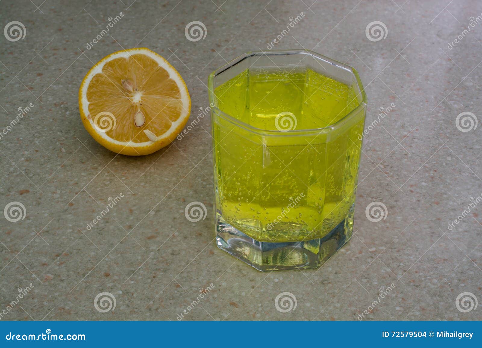 Lemon and Water with Bubbles on the Countertop Stock Photo - Image of ...