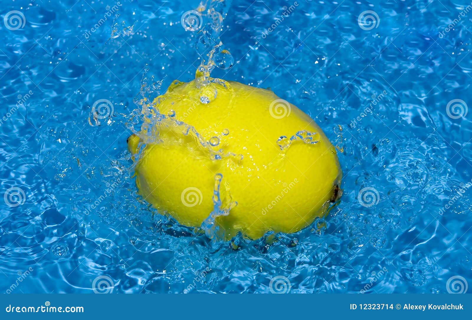 Lemon with water splash stock photo. Image of fruit, drop - 12323714