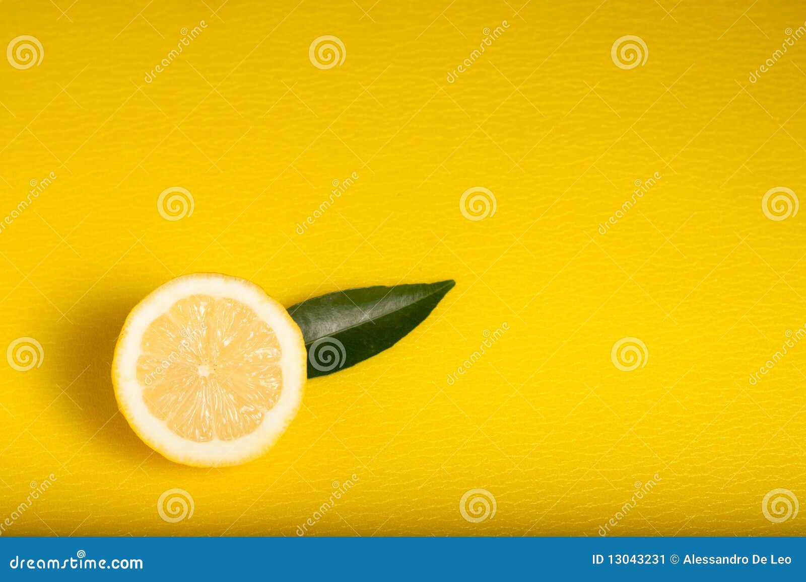 Lemon on Yellow Background stock image. Image of color - 13043231