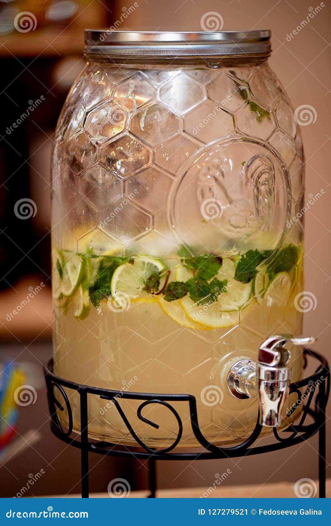 Lemonade in a Big Jar with a Tap.Oranges and Lemon. Refreshing Summer ...