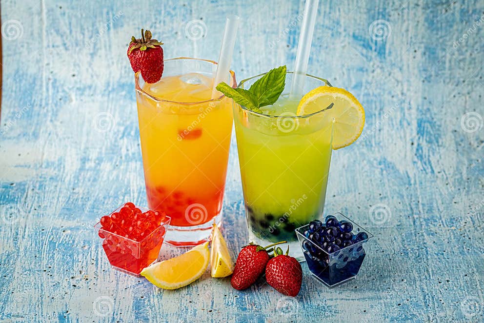 Lemonade with Bubble Tea on Blue Stone Background Stock Image - Image ...