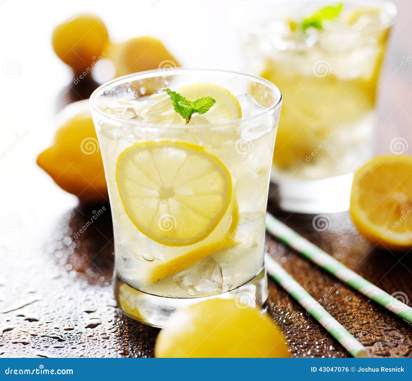 Lemonade in a Glass with Mint Garnish Stock Photo - Image of cool ...