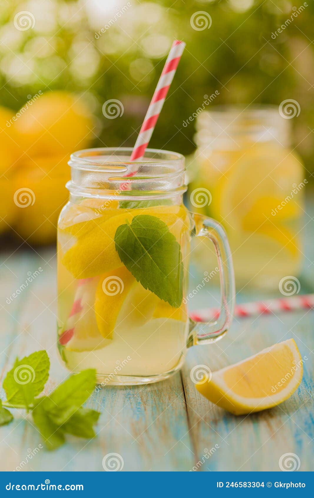 Lemonade with Mint on Rocks Served in Jar with a Straw Stock Photo ...