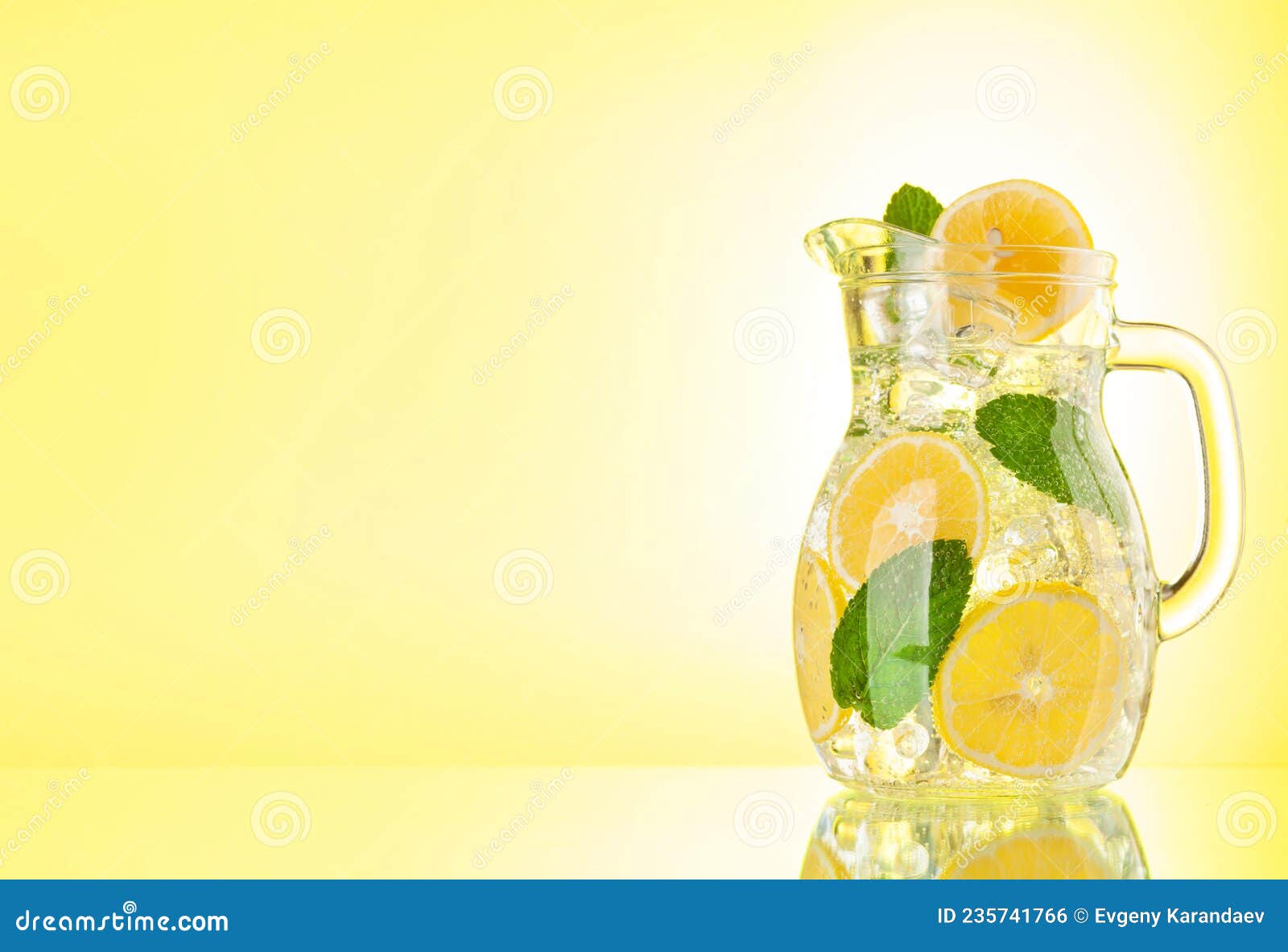 Lemonade Pitcher with Lemon Stock Photo - Image of healthy, drop: 235741766