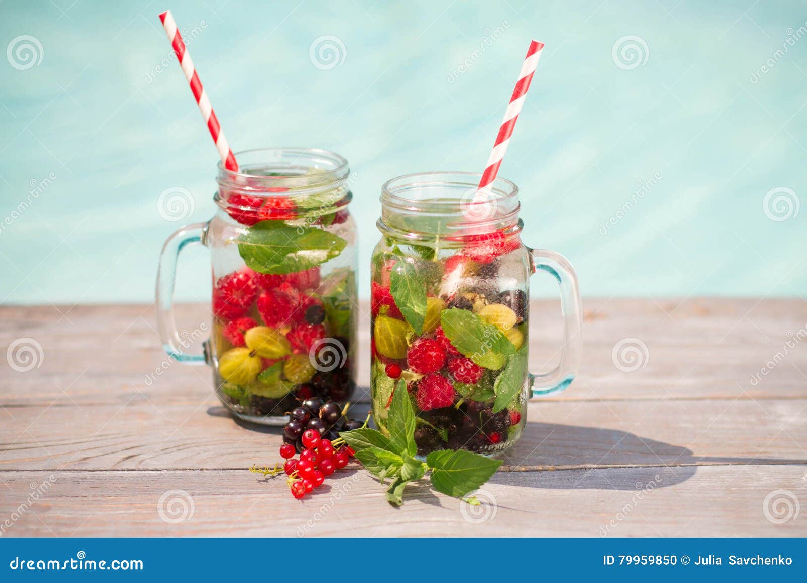 Lemonade with raspberries. stock photo. Image of pool - 79959850
