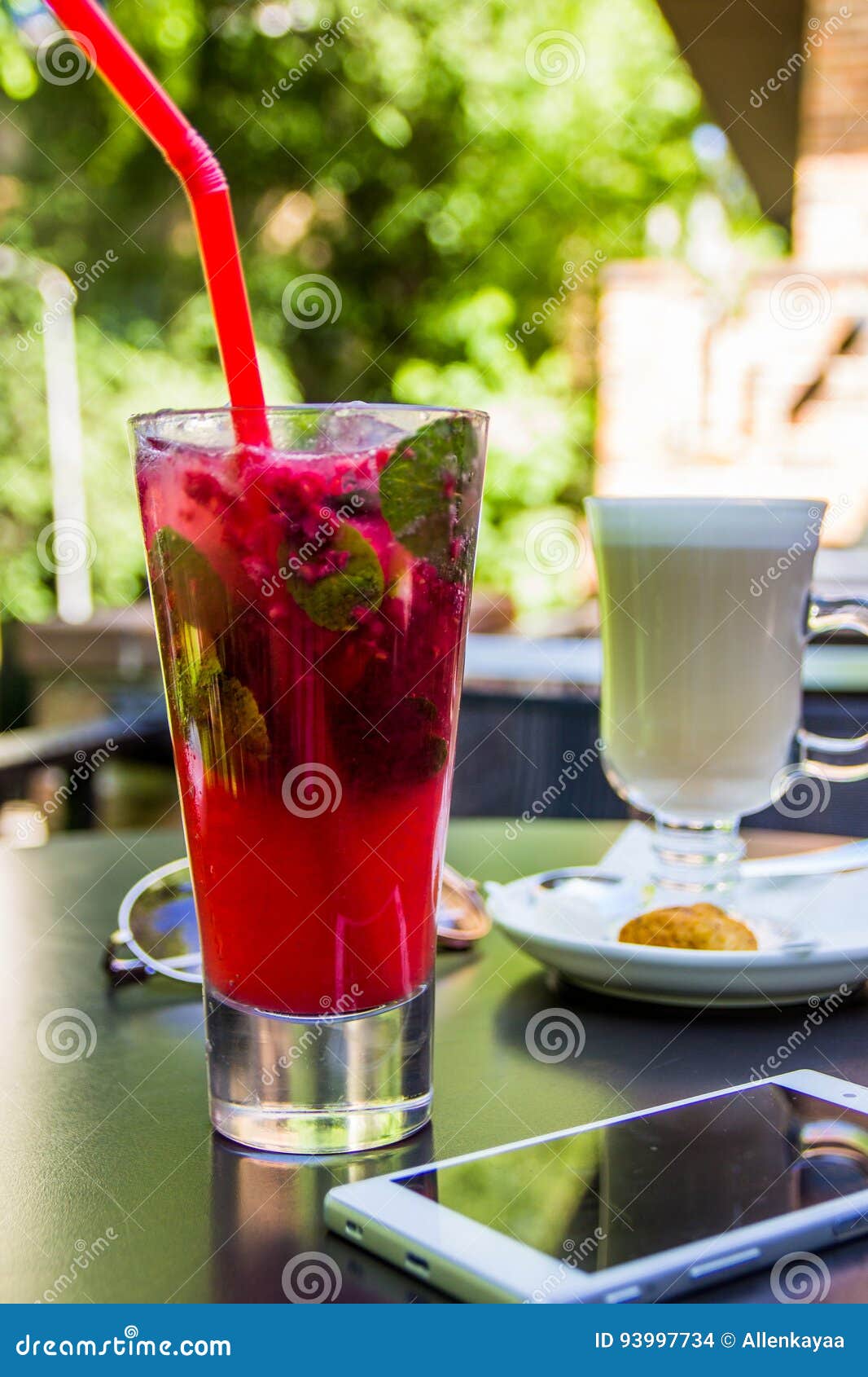 Lemonade with Raspberries and Mint and Coffee Latte on a Table I ...