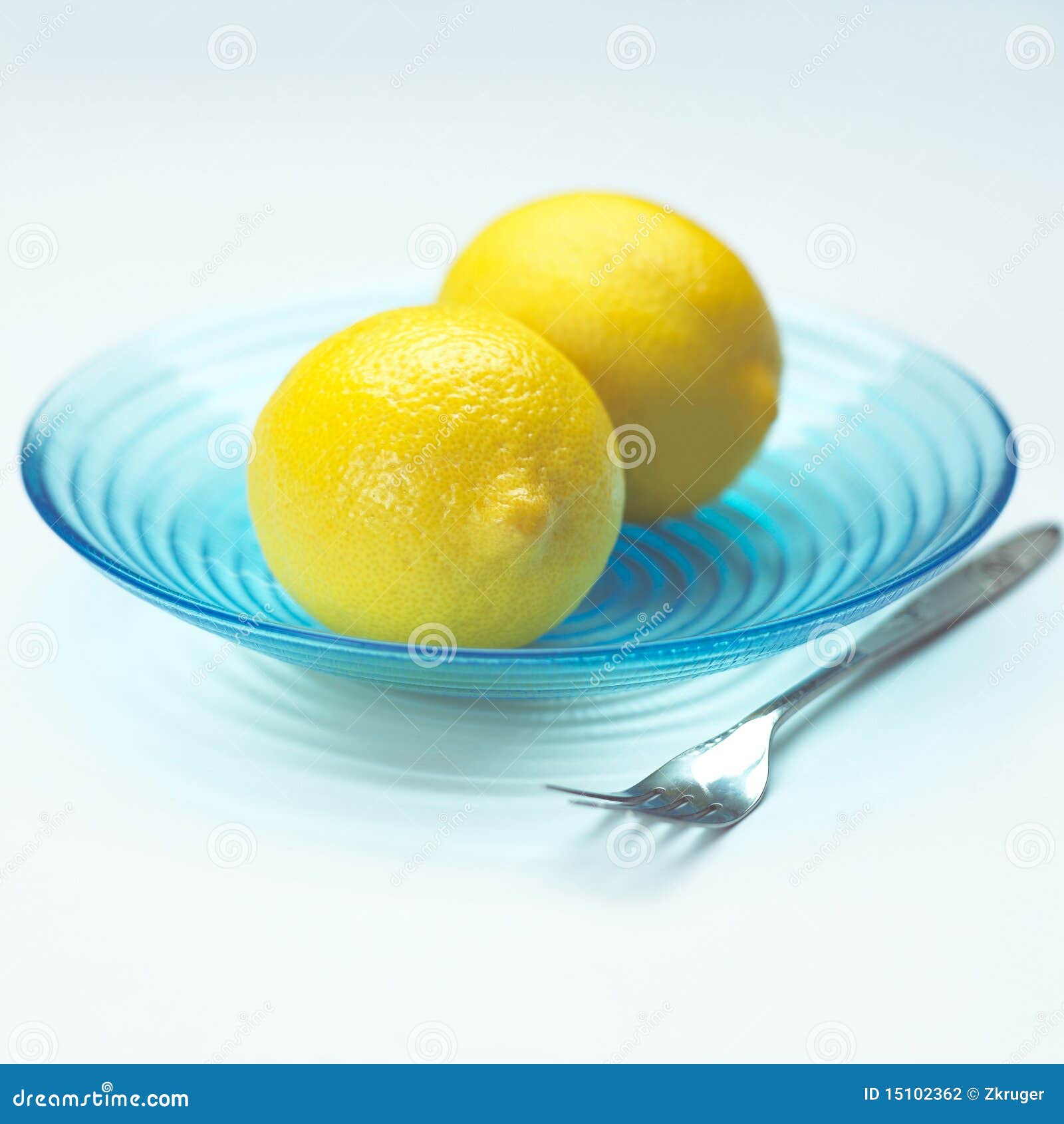 Lemons in blue bowl stock photo. Image of yellow, fruit - 15102362