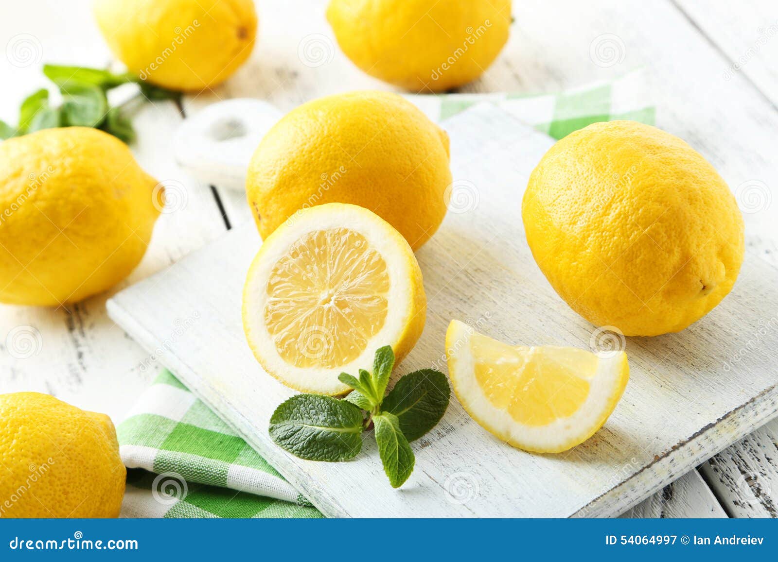 Lemons on cutting board stock image. Image of closeup - 54064997