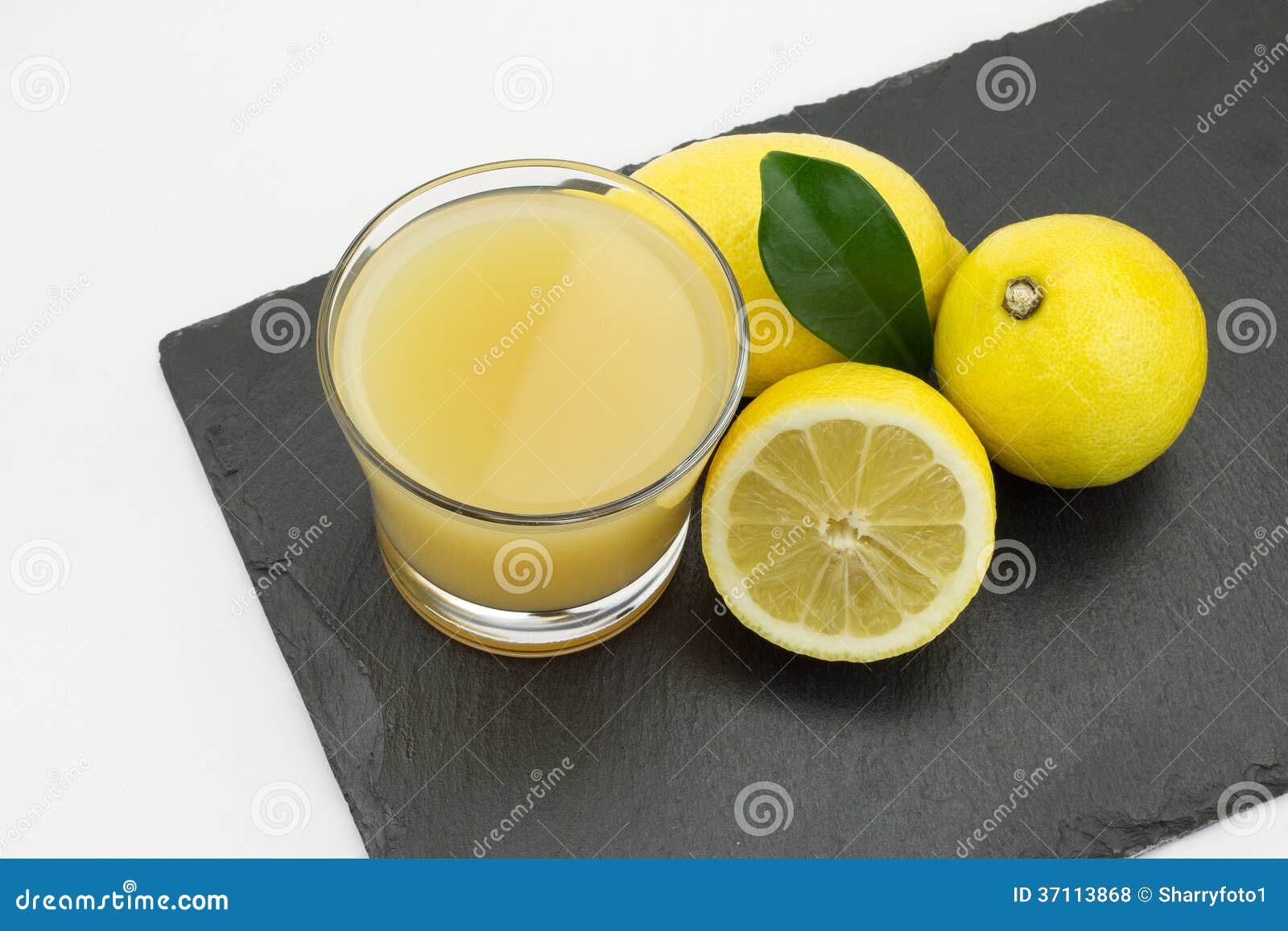 Lemons and lemon juice stock photo. Image of trade, glass - 37113868