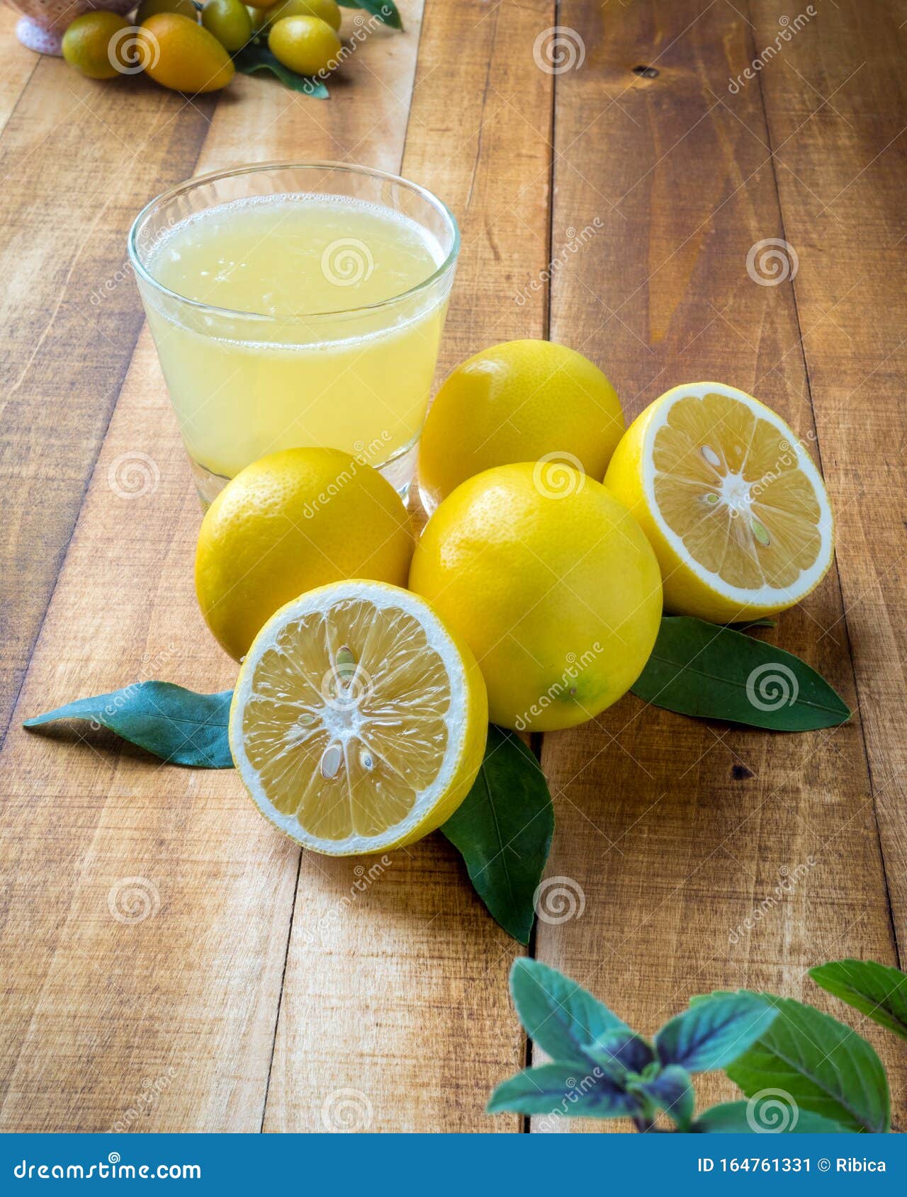 Lemons and Lemonade on a Table Stock Image - Image of table, yellow ...