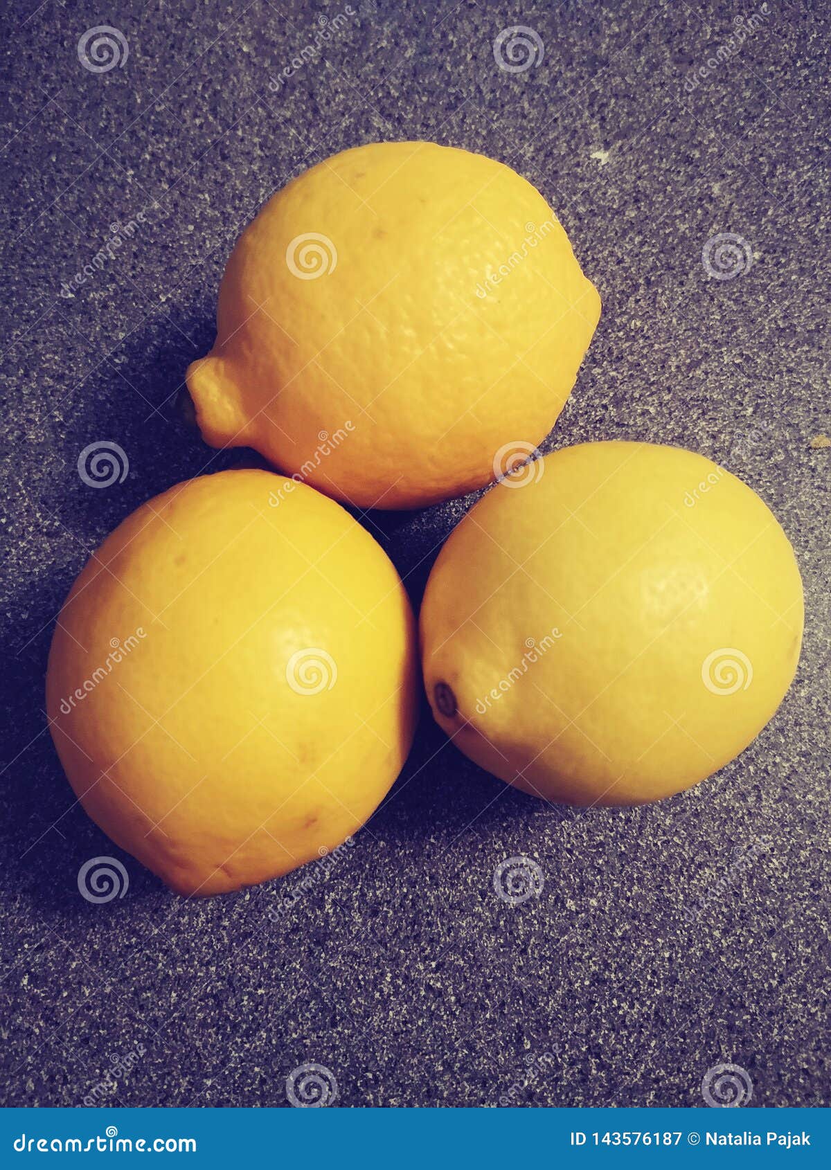 Three Yellow Lemons on the Table Stock Image - Image of table, lemons ...