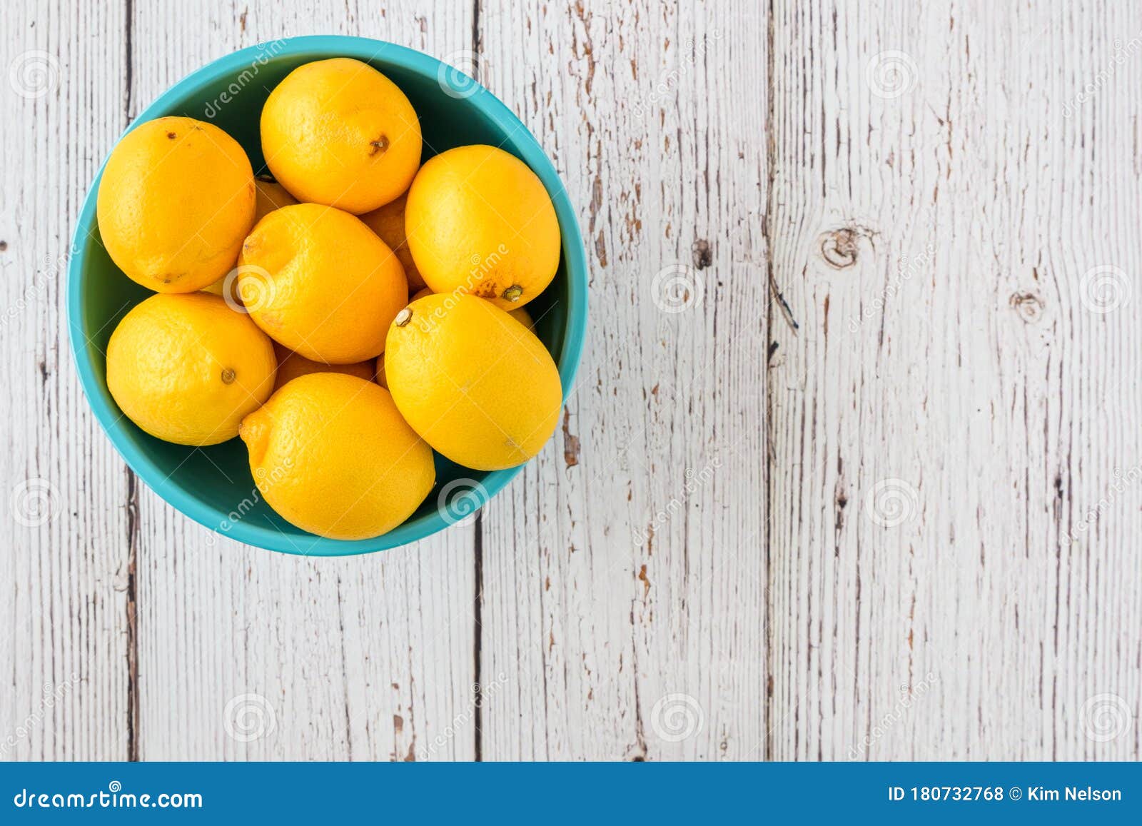Lemons in a Light Blue Bowl on a Whitewashed Wood Background Stock ...