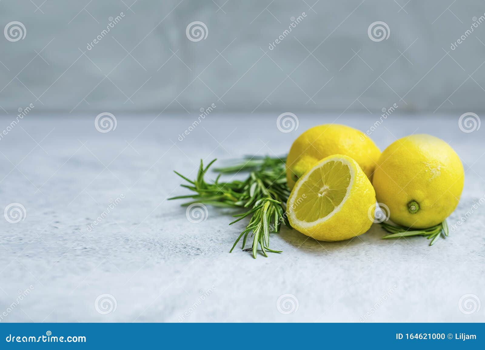 Lemons and Rosemary Branches Stock Photo - Image of pile, green: 164621000