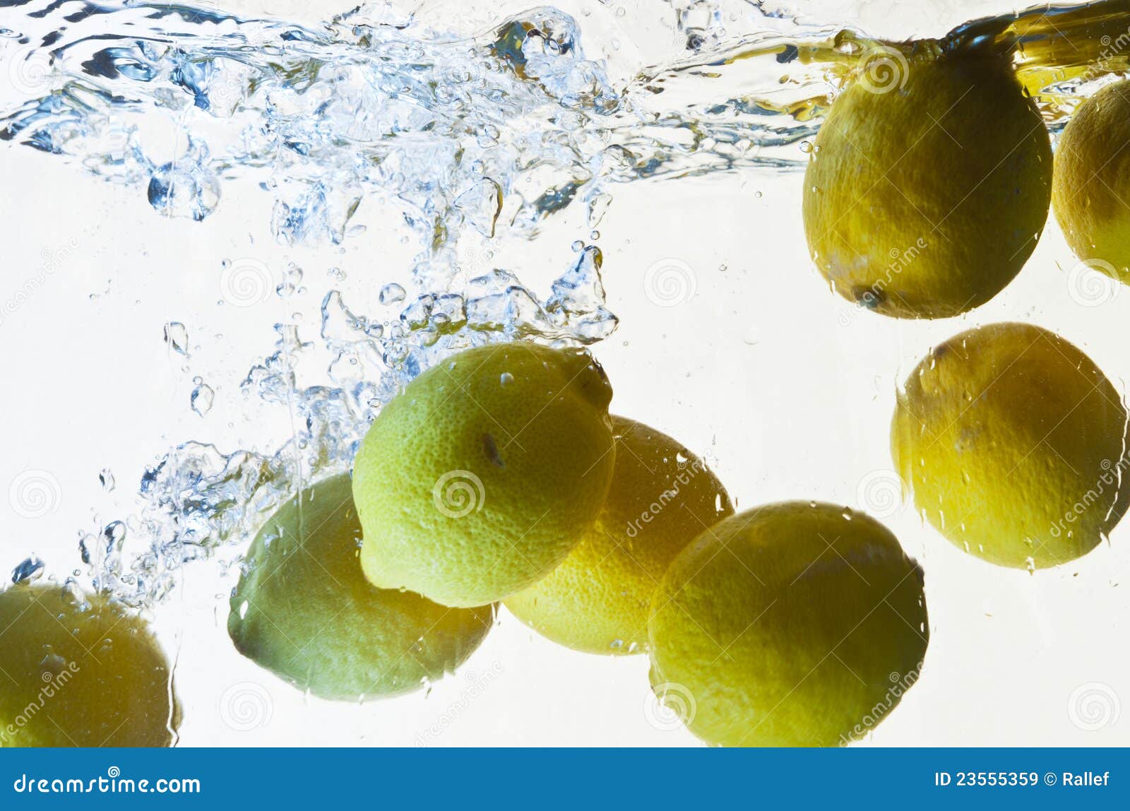 Lemons splash in Water stock image. Image of freshness - 23555359