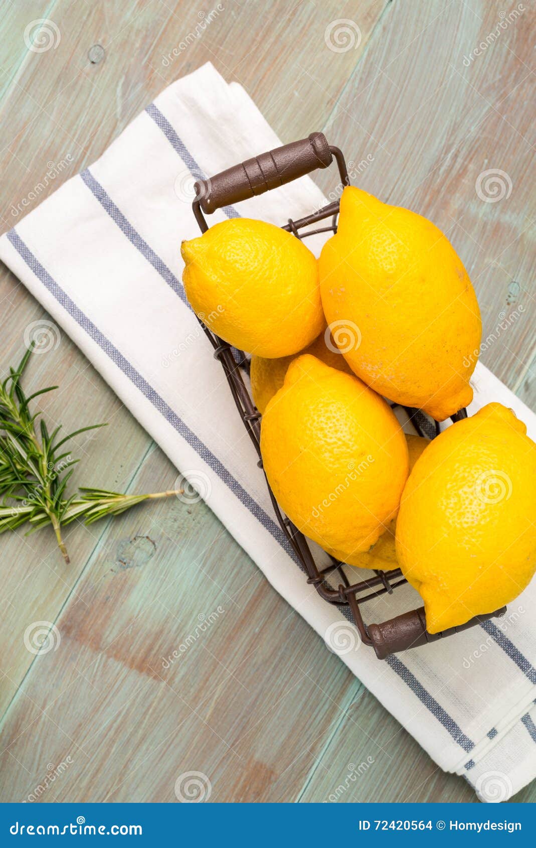 Lemons on table top stock photo. Image of clean, herb - 72420564