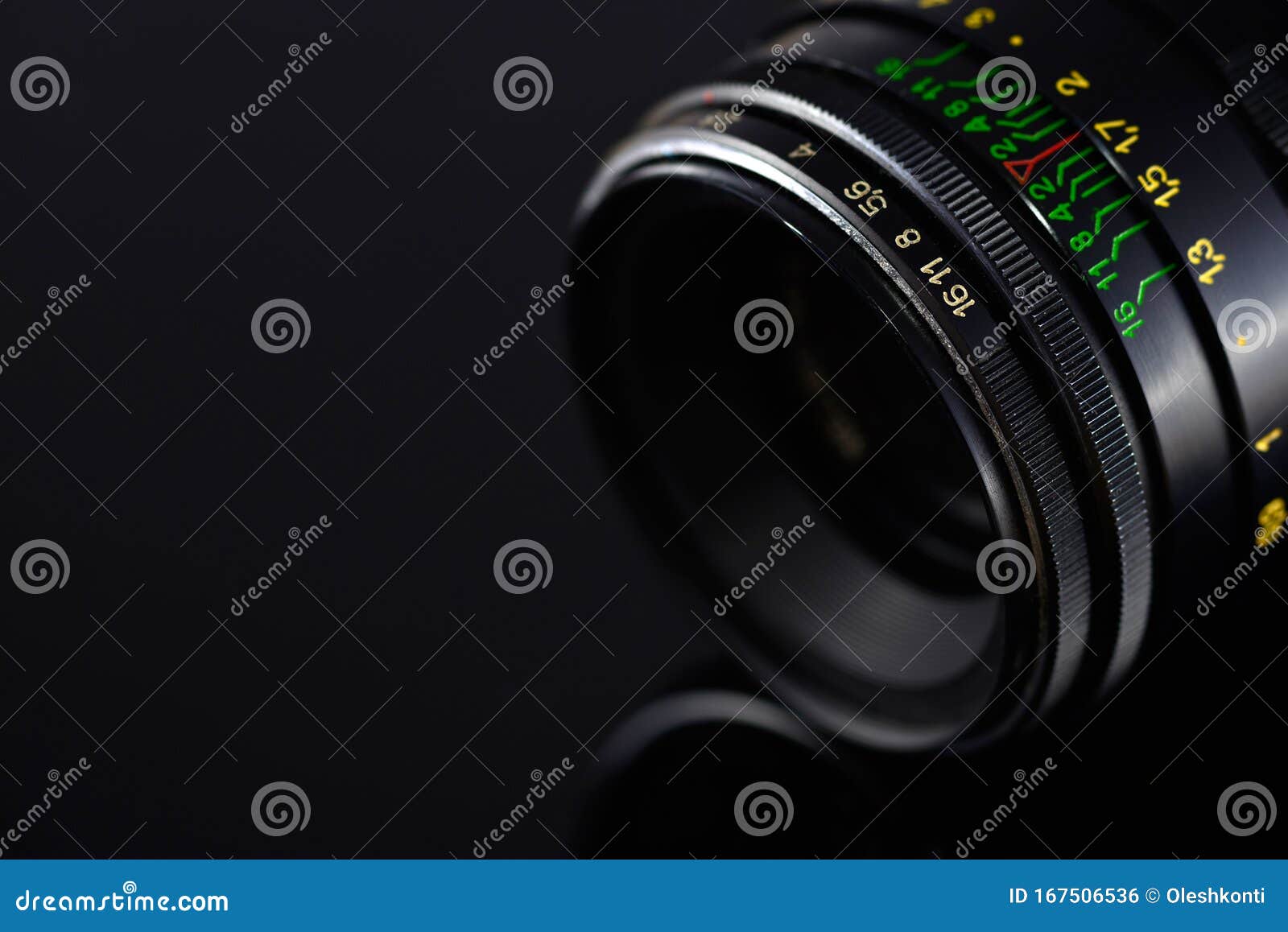 Lens on a black background stock photo. Image of isolated - 167506536