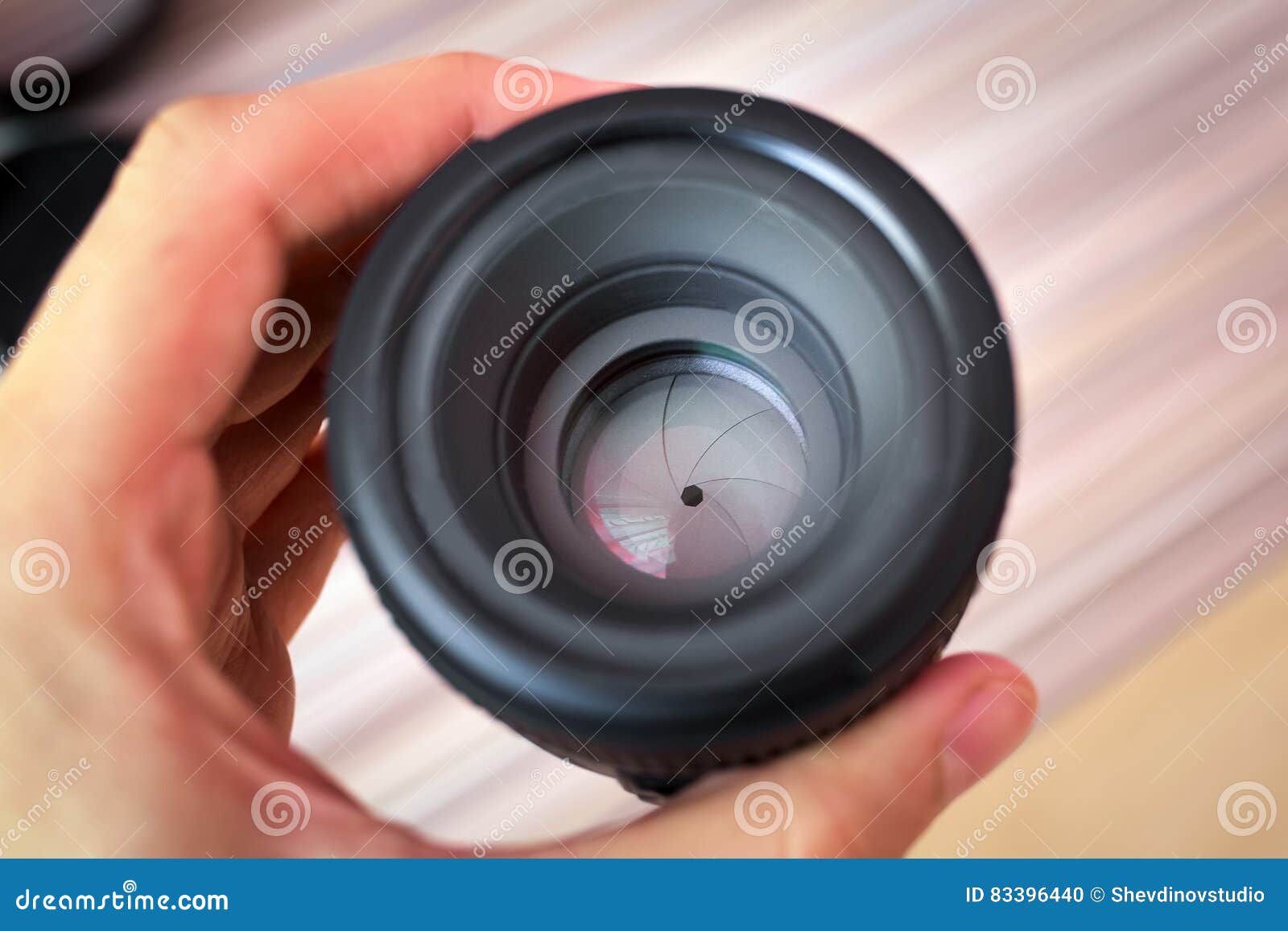 Lens in Hand Closed Diaphragm Stock Photo - Image of holding, aperture ...