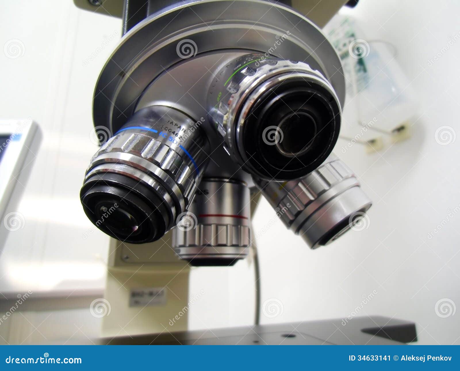 Lenses of a microscope stock image. Image of metallic - 34633141