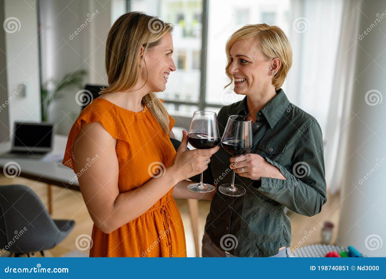 Lovely Lesbian Couple Spending Time Together And Drinking Wine Lgbt