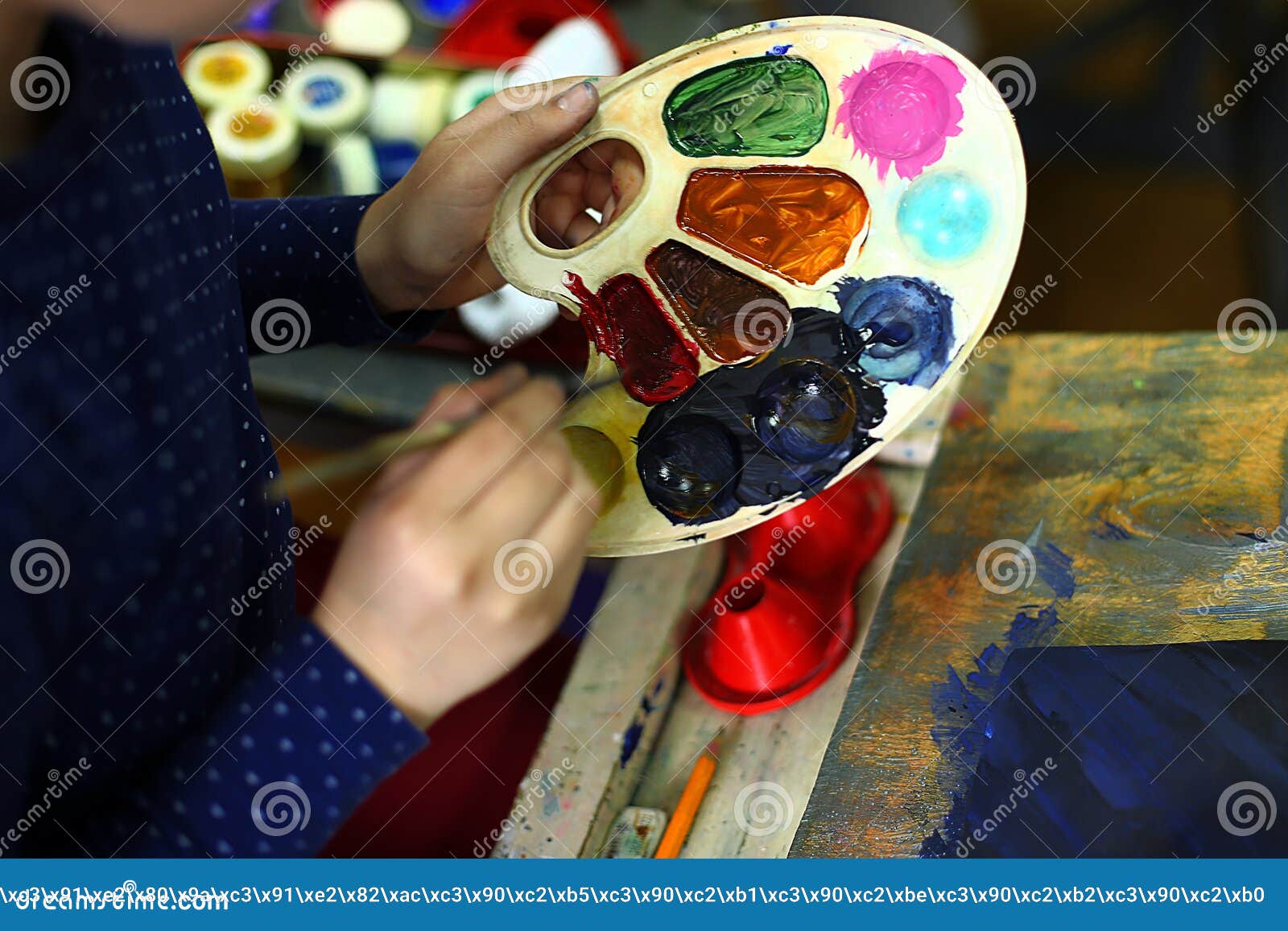 A Lesson in an Art School for Children on Paint, Modeling and ...