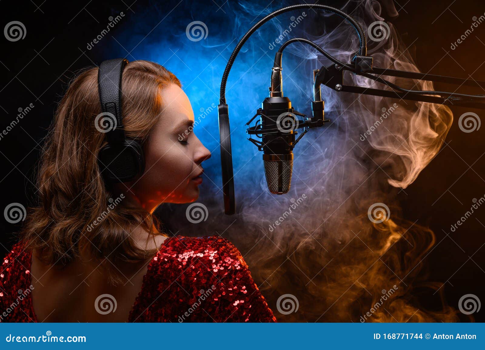 Lesson and Training in Vocal and Singing. a Girl Sings into a ...