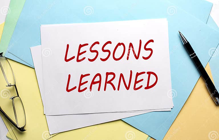 LESSONS LEARNED Text on Paper on the Colorful Paper Background Stock ...