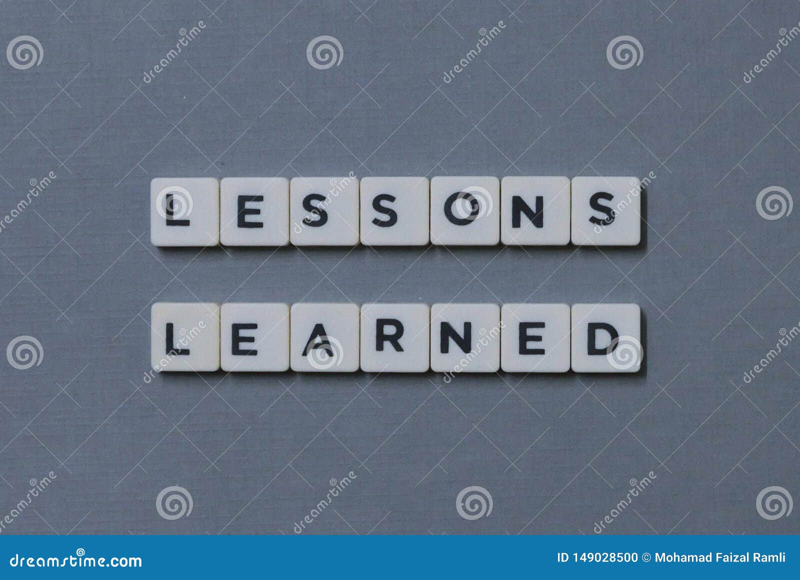 Lessons Learned Word Made of Square Letter Word on Grey Background ...