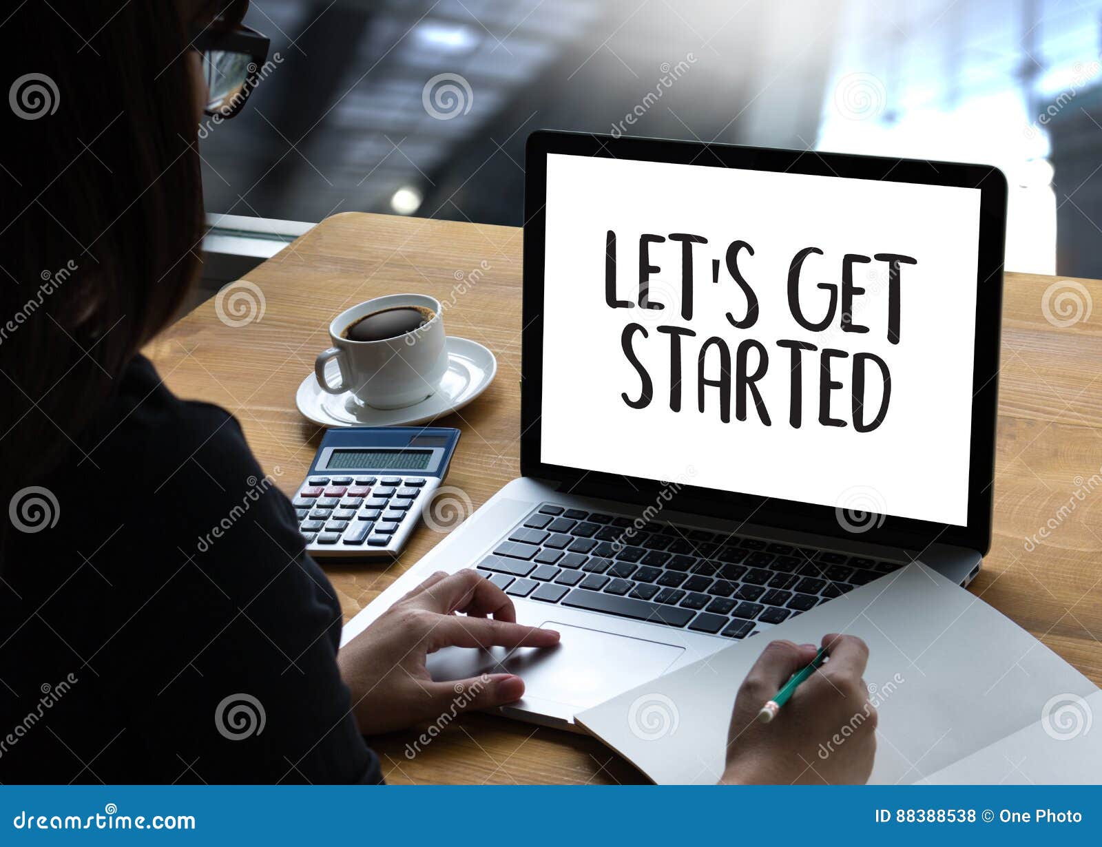 LET S GET STARTED Two Businessman Working at Office Desk and Usi Stock ...