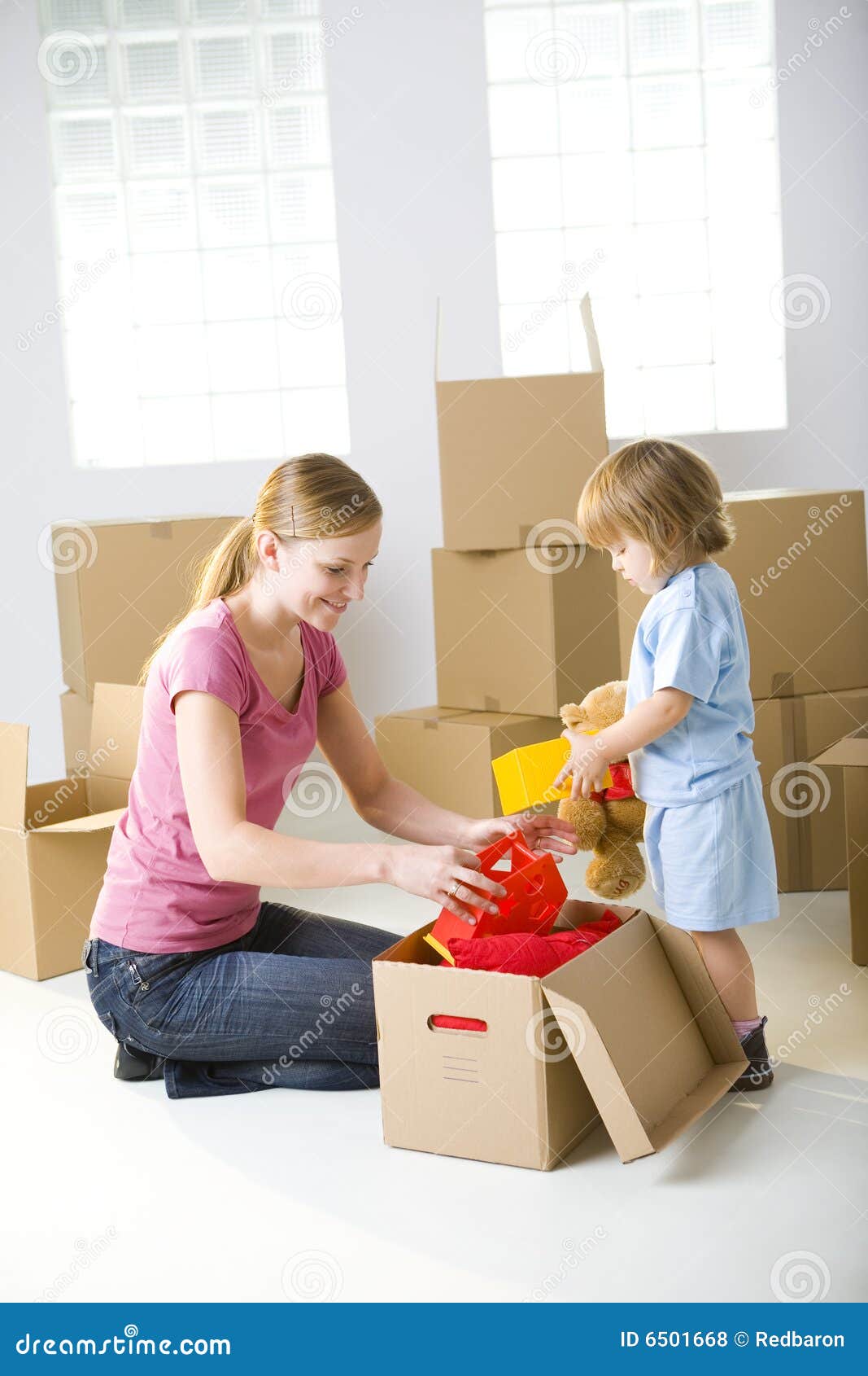 Let s unpack your toys stock photo. Image of child, parent - 6501668