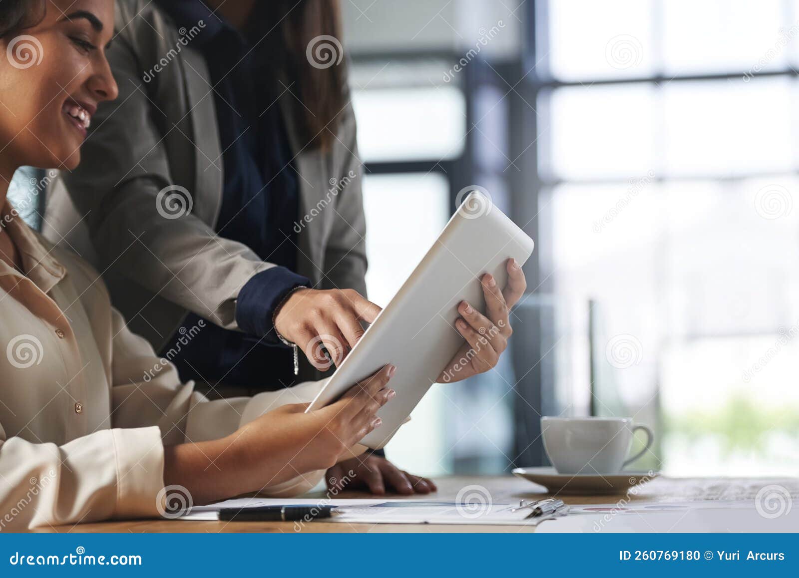 Let Technology Help Simplify Your Workload. Two Colleagues Working ...