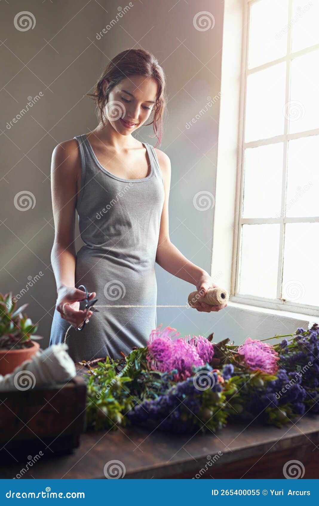 Let Your Creativity Flow. a Young Florist Cutting Flowers To Make Up a ... Let Your Creativity Flow. a Young Florist Cutting Flowers To Make Up a ...
