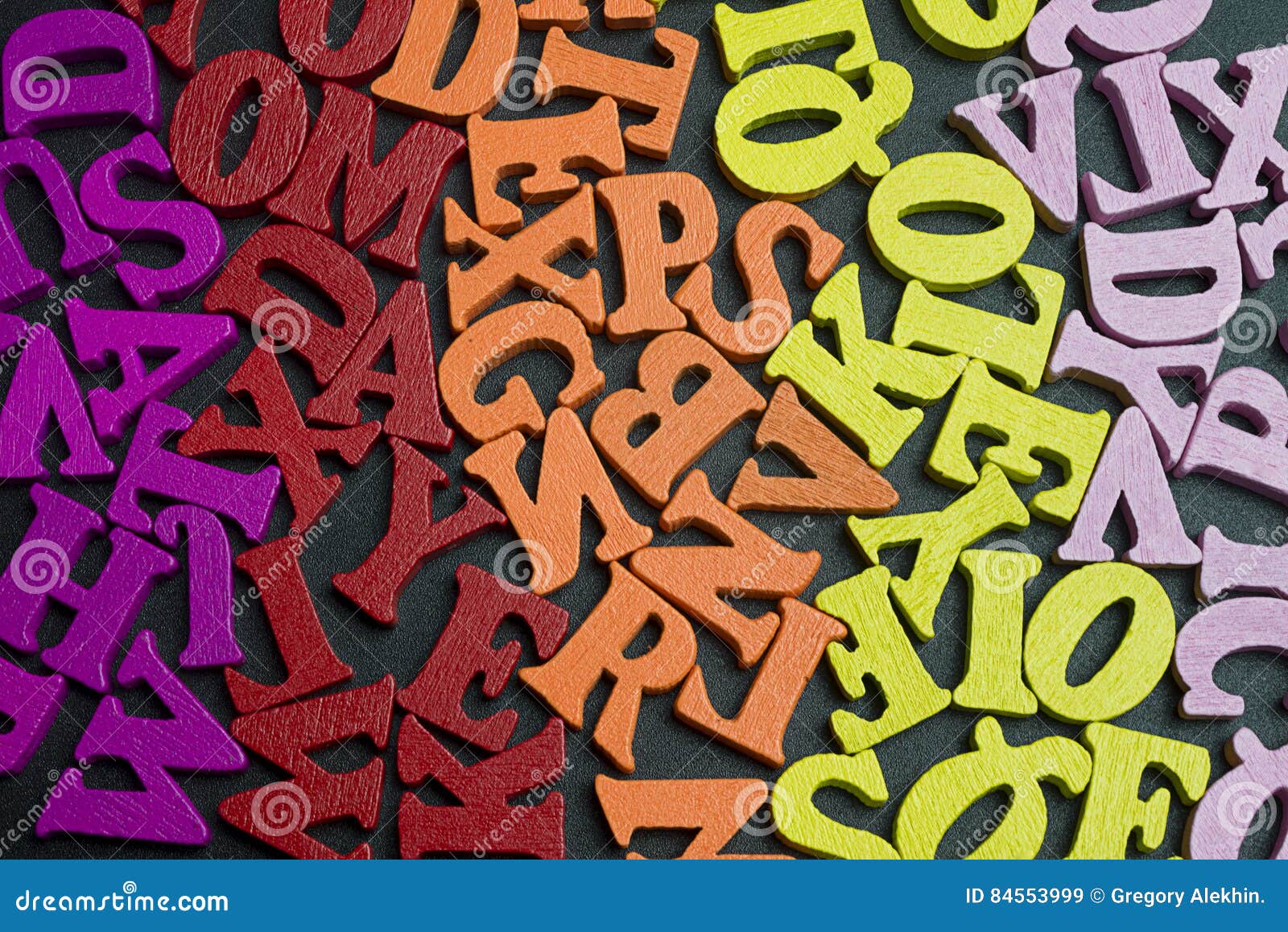 Letras de cores diferentes imagem de stock. Imagem de alaranjado - 84553999