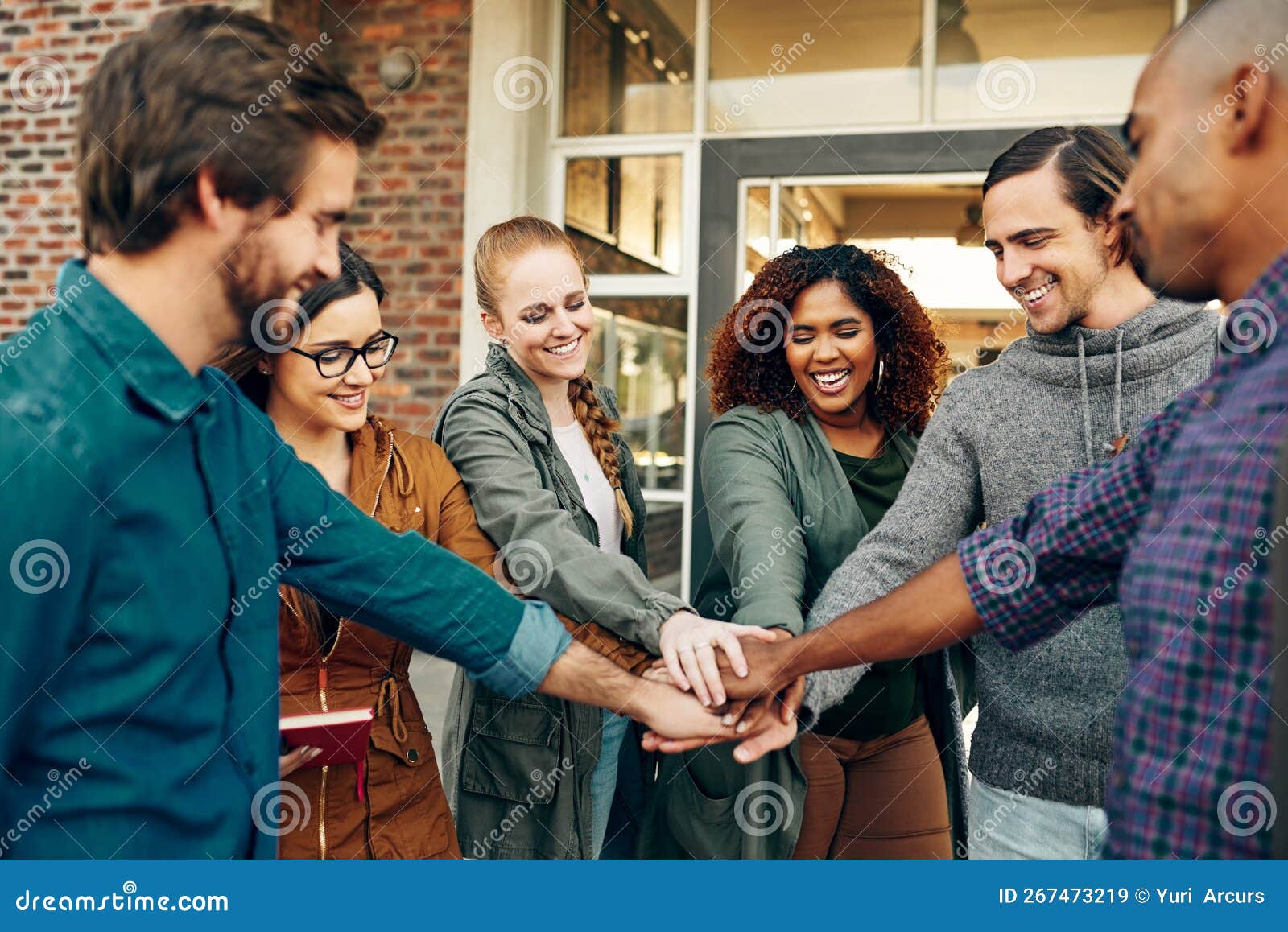 Lets Get Our Learning on. a Group of Young Students Joining Their Hands ...