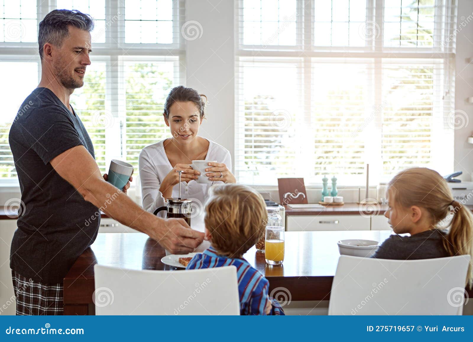 Lets Get Ready for a Fun Day Ahead...a Family Having Breakfast Together ...