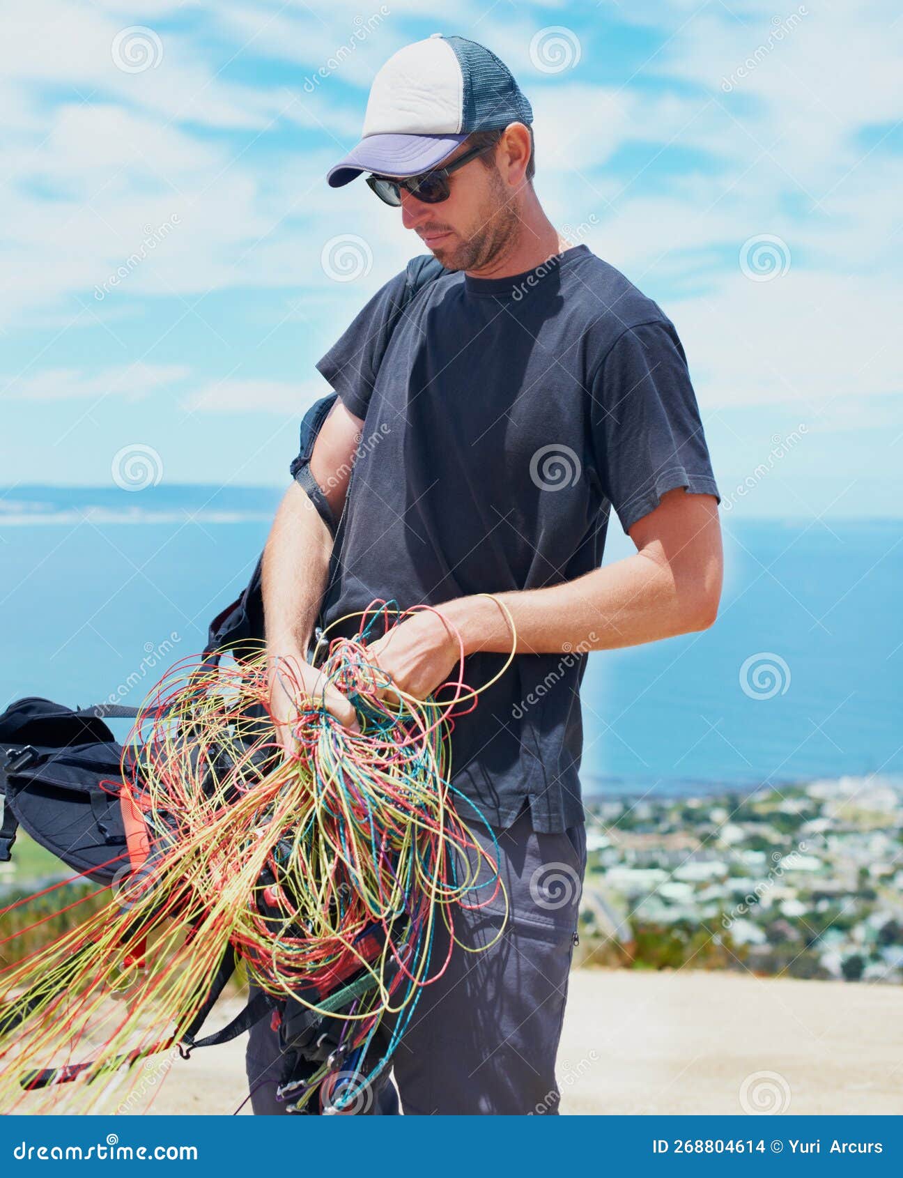 Lets Get Ready To Fly. a Man Getting Ready To Go Paragliding. Stock ...