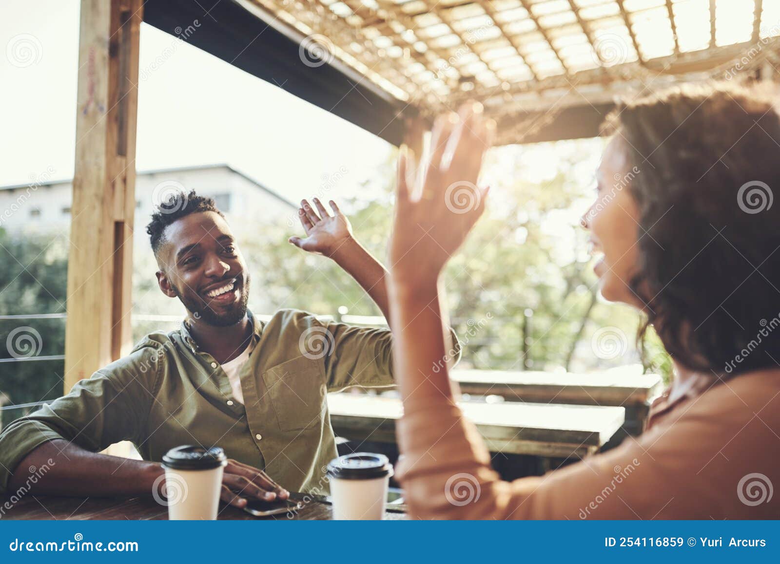 Lets Get this Weekend Started. a Young Couple Giving Each Other a High ...
