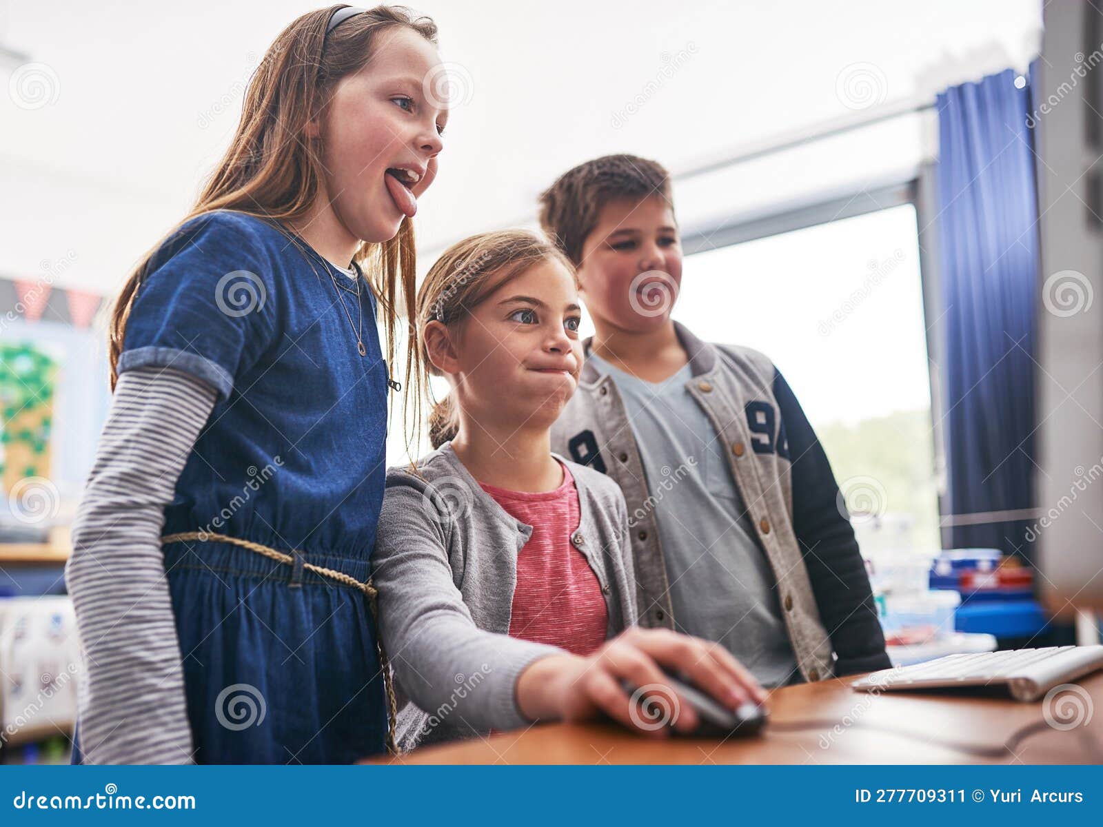 Lets Make Funny Faces and Take Pictures. Elementary School Children in ...