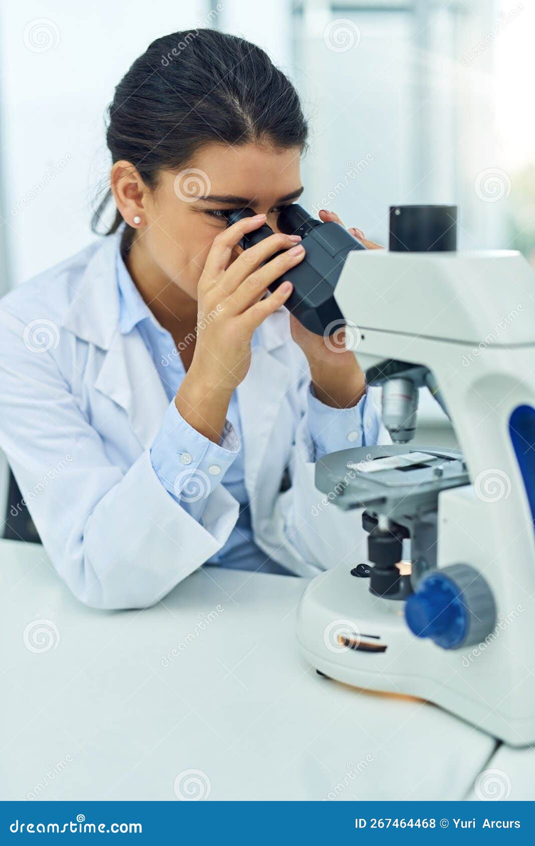 Lets See What we Have Here...a Young Scientist Using a Microscope in a ...