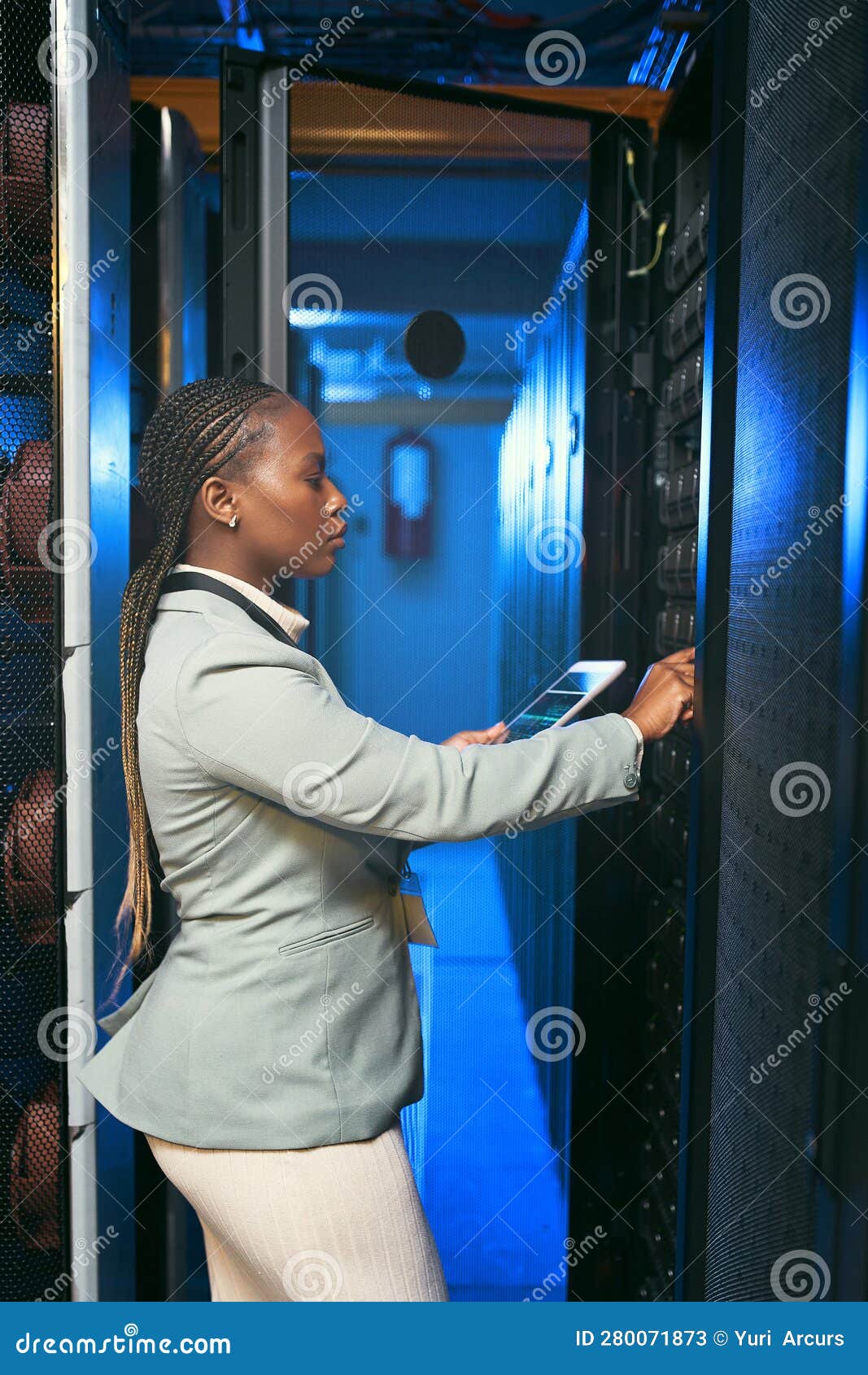 Lets Take a Closer Look. a Young it Specialist Standing Alone in the ...
