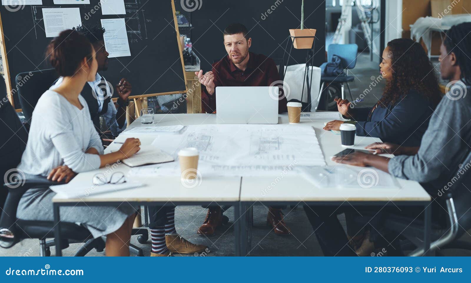 Lets Talk about these Blueprints. a Group of Creative Businesspeople ... Lets Talk about these Blueprints. a Group of Creative Businesspeople ...