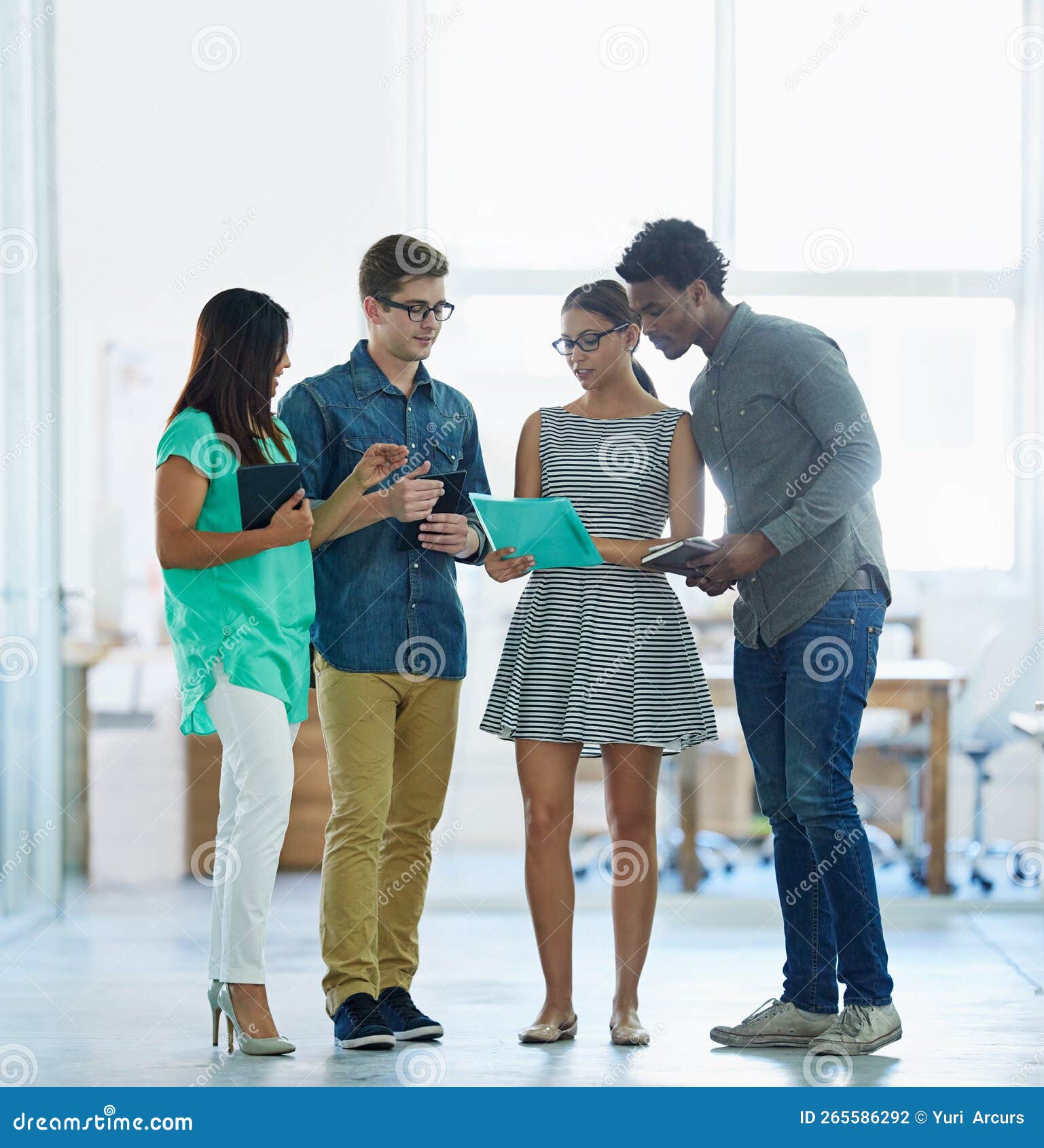 Lets Talk and Walk. a Diverse Group of Colleagues Talking Together ...