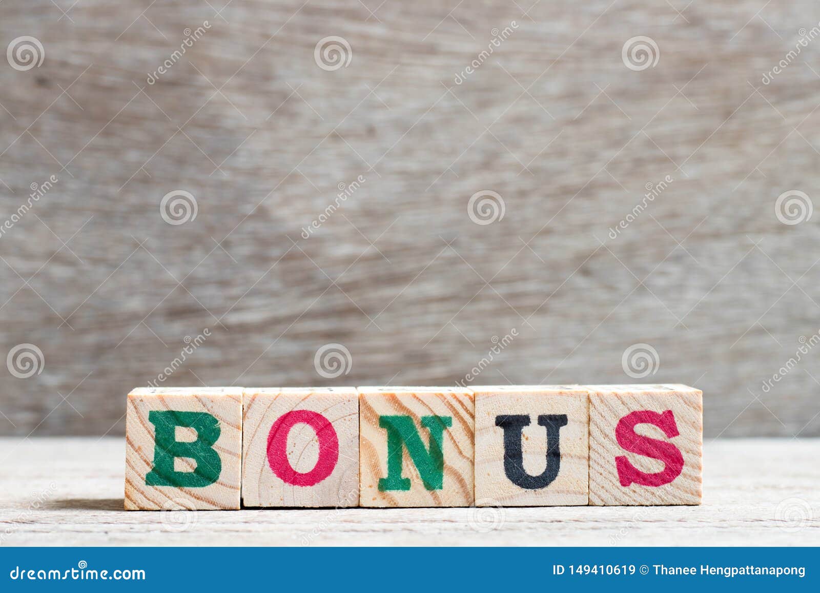 Letter Block in Word Bonus on Wood Background Stock Image - Image of ...