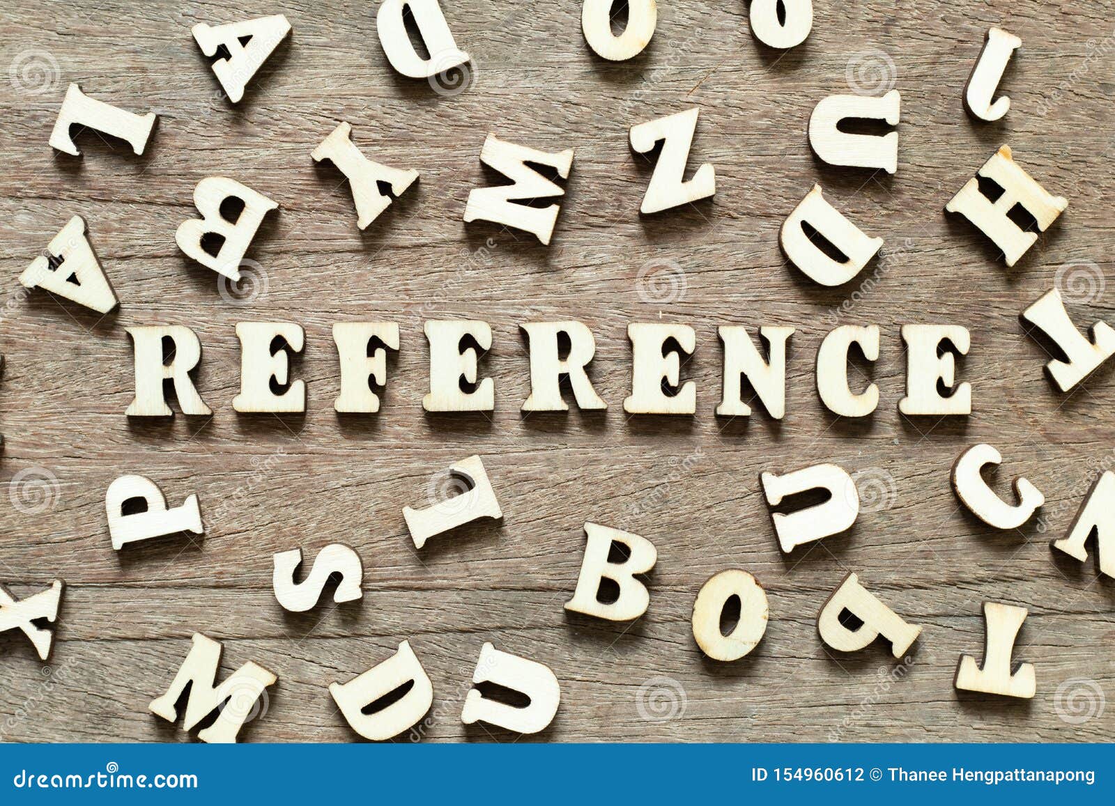 Letter in Word Reference with Another Letter on Wood Background Stock ...